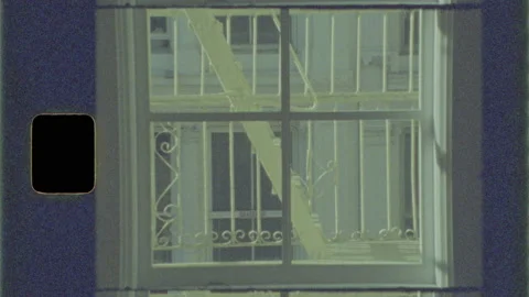 Vintage Footage of a Fire Escape Through... | Stock Video | Pond5