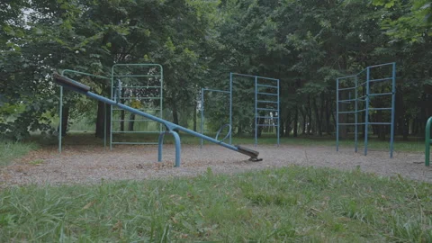 Vintage playground with old seesaw equip... | Stock Video | Pond5