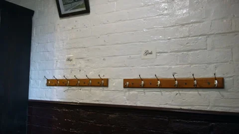 Vintage school pegs, labelled as boys an... | Stock Video | Pond5