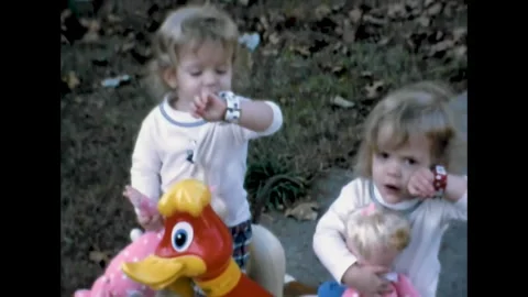 Vintage Super 8 - USA 1968: Twins play w... | Stock Video | Pond5