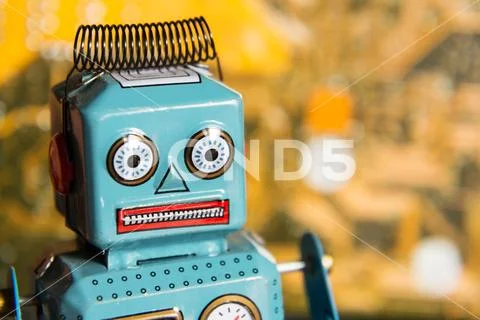 Photograph: Vintage tin toy robot with computer board, artificial ...