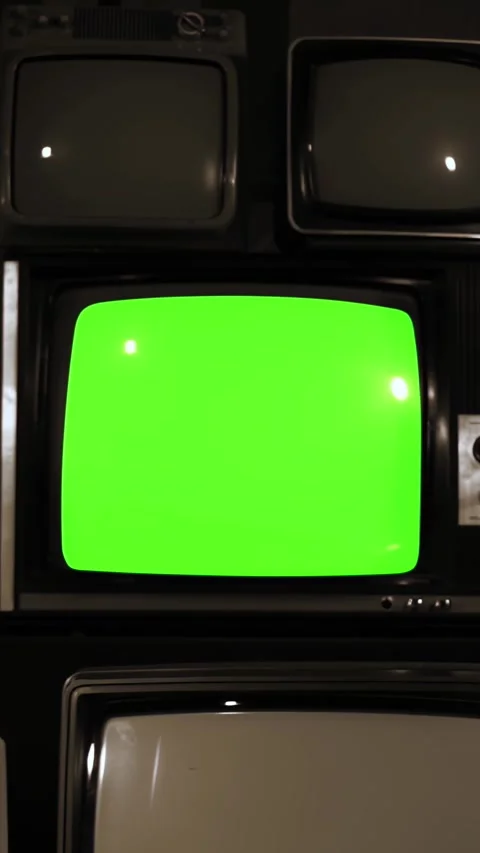 Vintage TV with Green Screen Among Retro... | Stock Video | Pond5