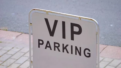 VIP parking sign prominently displayed o... | Stock Video | Pond5