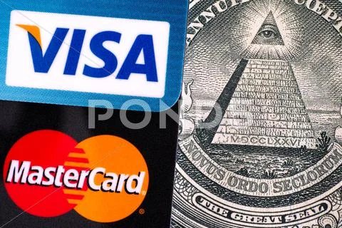 Photograph: Visa and MasterCard cards on one dollar bill with pyramid ...
