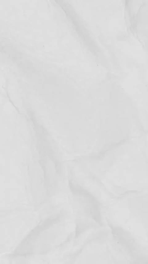 A visual of a wrinkled paper on a green ... | Stock Video | Pond5