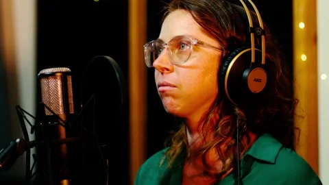 Voice-over actress recording in the stud... | Stock Video | Pond5