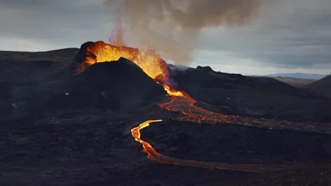 Volcanic eruption explosion and lava flo... | Stock Video | Pond5