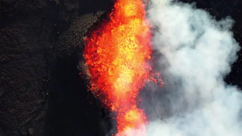 Volcano eruption, branching lava stream.... | Stock Video | Pond5