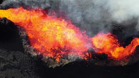 Volcano eruption, branching lava stream.... | Stock Video | Pond5