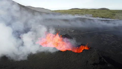 Volcano eruption, branching lava stream.... | Stock Video | Pond5