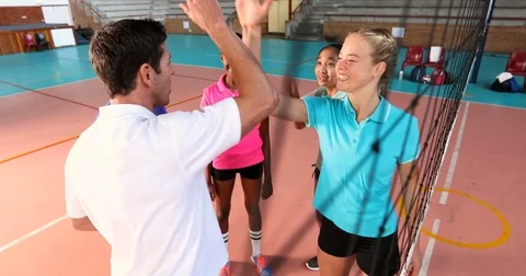 Volleyball coach giving high five and fo... | Stock Video | Pond5