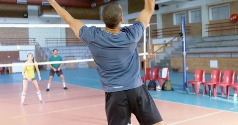 Volleyball players playing volleyball in... | Stock Video | Pond5