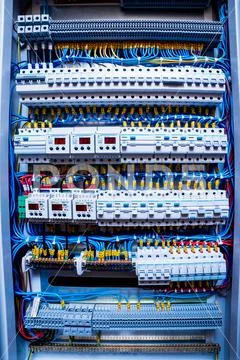 Voltage switchboard with circuit breakers. Electrical background. ~ Hi ...