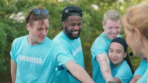 Volunteer high five together hands greet... | Stock Video | Pond5