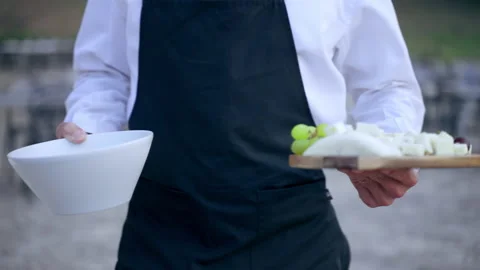 Waiter in uniform walking to the banquet... | Stock Video | Pond5