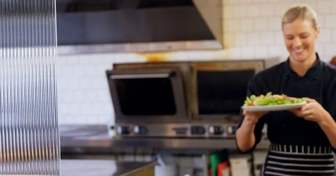 Waitress serving food to customer 4k | Stock Video | Pond5