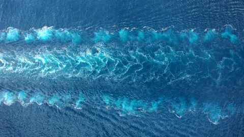 Wake of a cargo ship texture on the sea ... | Stock Video | Pond5