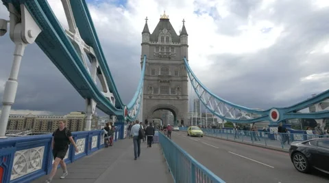 Walking and driving cars on Tower Bridge... | Stock Video | Pond5