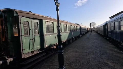 Walking between vintage steam engine pas... | Stock Video | Pond5