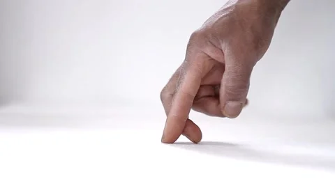 walking fingers on table with white back... | Stock Video | Pond5