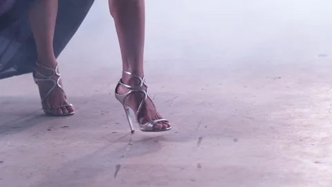 walking on high heels with dramatic smok... | Stock Video | Pond5