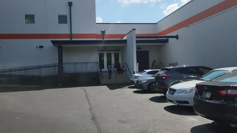 Walking IMSA High School Building Math S... | Stock Video | Pond5