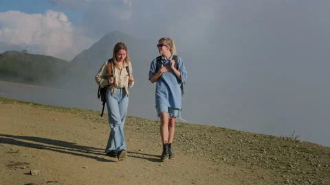 Walking just a step away from the clouds | Stock Video | Pond5