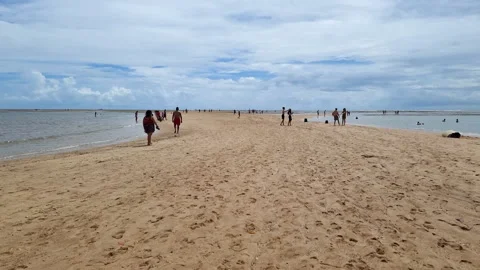 Walking on the Path of Moses, a sand ban... | Stock Video | Pond5