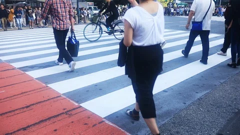 Walking people on the diagonal line at t... | Stock Video | Pond5