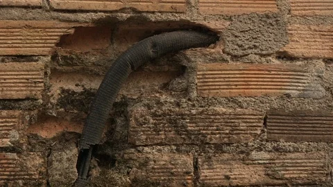 WALL OF BRICKS AND PIPE TEXTURE | Stock Video | Pond5