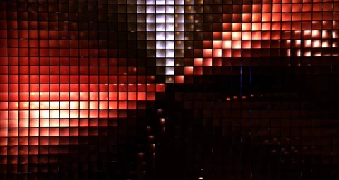 Wall of cell tiles with flashes of light | Stock Video | Pond5