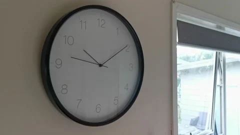 Wall clock seconds hand stuck due to low... | Stock Video | Pond5