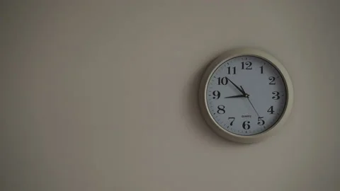 Wall clock ticking showing nine hours, t... | Stock Video | Pond5
