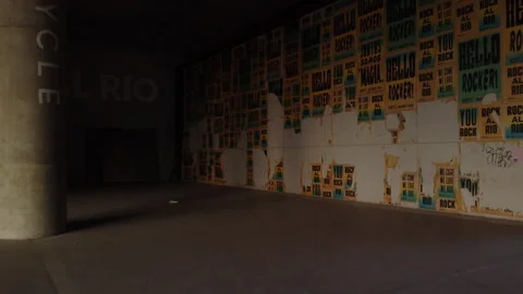 A wall covered with posters, day, warm l... | Stock Video | Pond5