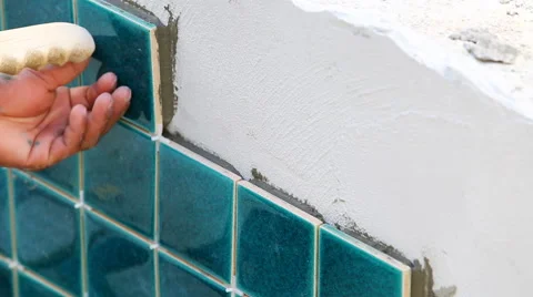 Wall tile installation for house buildin... | Stock Video | Pond5