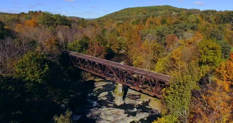 Walloomsac River Fall Foliage trestle br... | Stock Video | Pond5