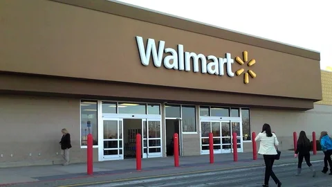 Walmart customers enter storefront doors | Stock Video | Pond5