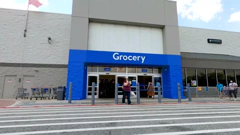 Walmart large crowds of people enter and... | Stock Video | Pond5