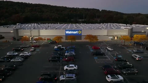 Walmart at night. Lights on sign of supe... | Stock Video | Pond5