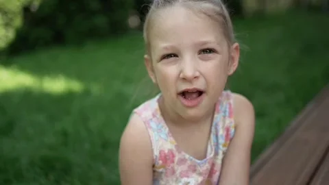 Walnuts in hands. Smiling child girl eat... | Stock Video | Pond5