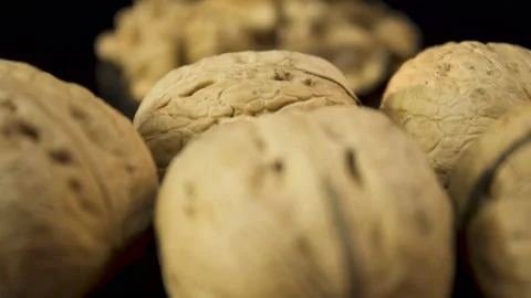 Walnuts in shell and without shell on a ... | Stock Video | Pond5
