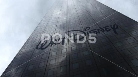 Walt Disney Pictures logo on a skyscraper facade reflecting clouds ...