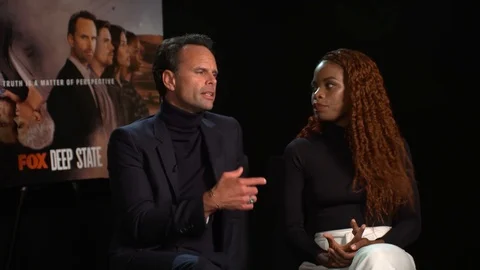 Walton Goggins and Lily Banda are interv... | Stock Video | Pond5
