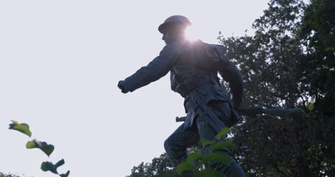 War memorial of soilder running into bat... | Stock Video | Pond5