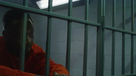 Warden stands in front of prisoner jail ... | Stock Video | Pond5