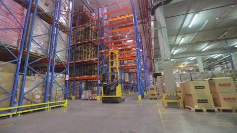 Warehouse work. Workflow in a large ware... | Stock Video | Pond5