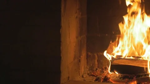 Warm cozy fire in a Home Fireplace. Real... | Stock Video | Pond5