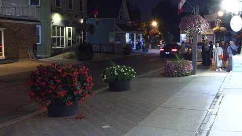 Warm ummer night with people walking and... | Stock Video | Pond5