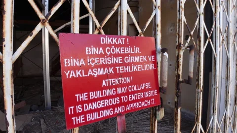 Warning sign broken storefront in abando... | Stock Video | Pond5