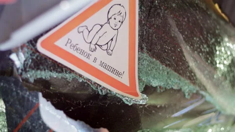 Warning sign of children inside a car af... | Stock Video | Pond5